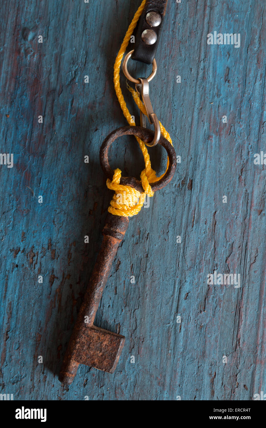 Photo for background, old key on the old wooden table Stock Photo - Alamy