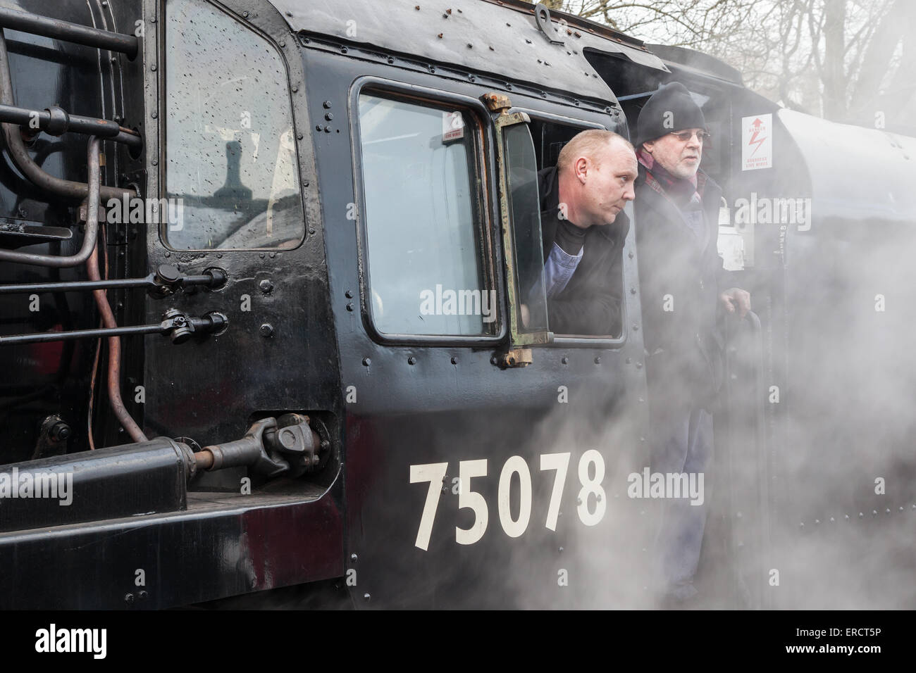 The crew of a steam locomotive at Oxenhope station on the Keighley ...