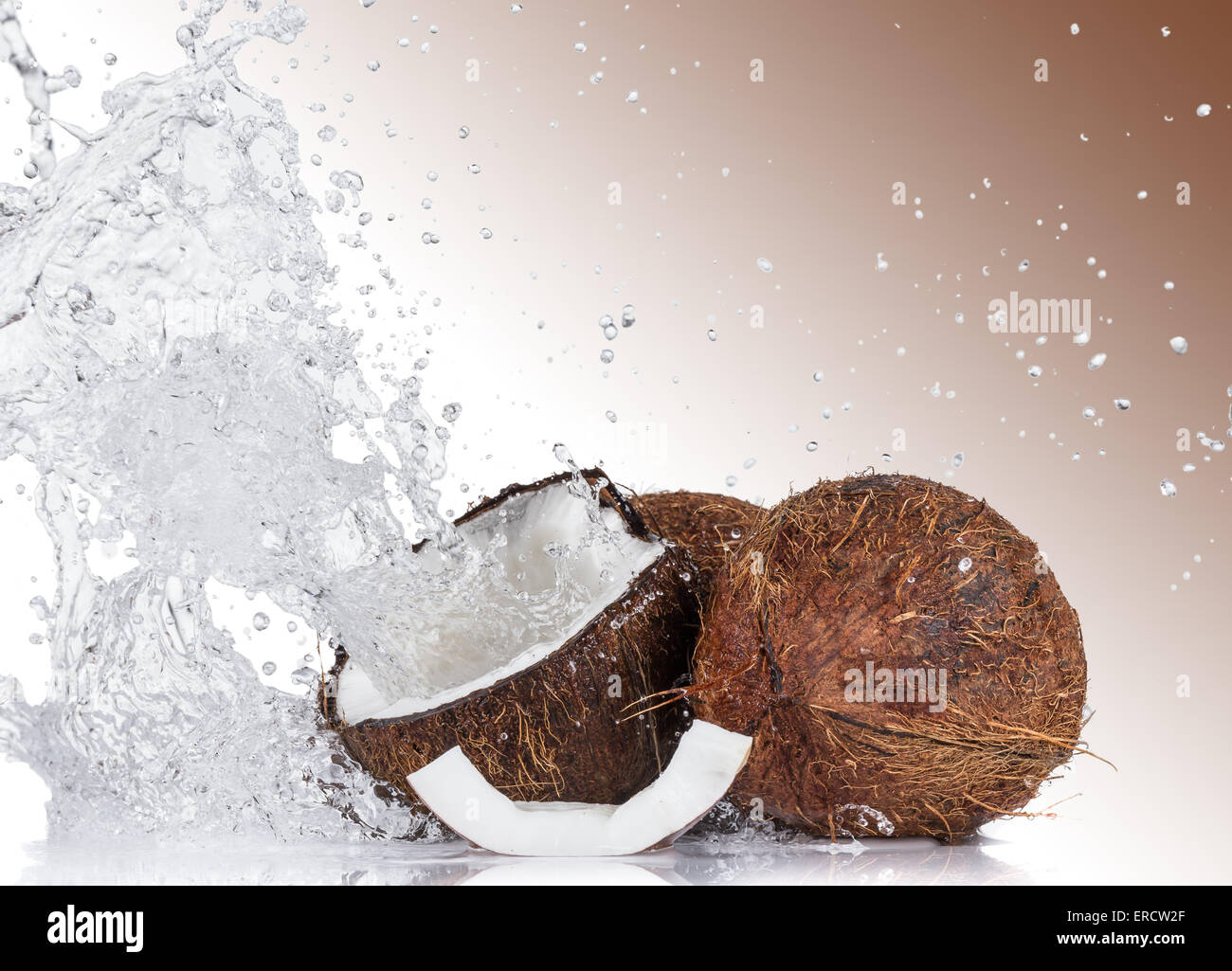 Cracked coconuts on white background, close-up Stock Photo - Alamy