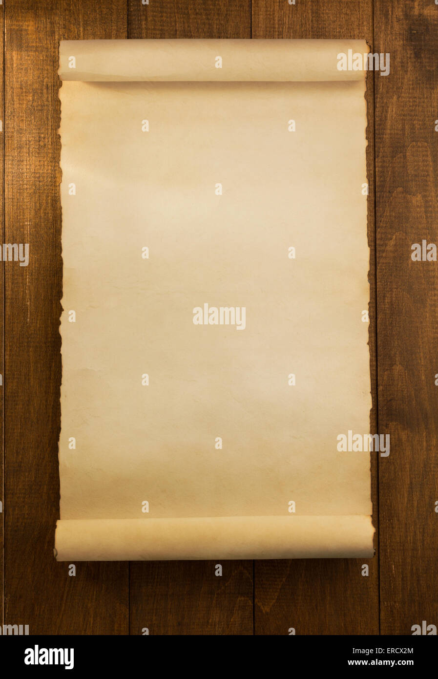 parchment scroll on wooden background Stock Photo - Alamy