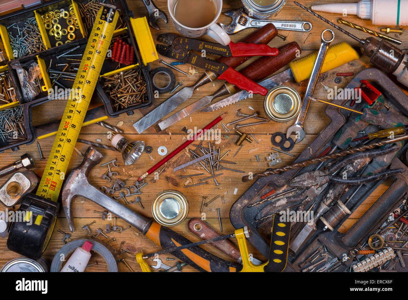 Home maintenance - An untidy workbench full of dusty old tools and ...