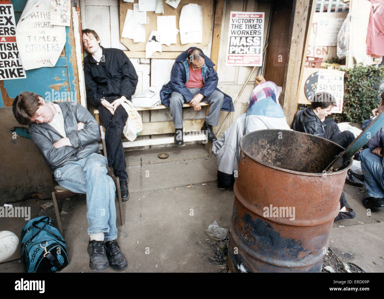 Timex strike 1993. Pictured weary ... a long day on foot proves too ...