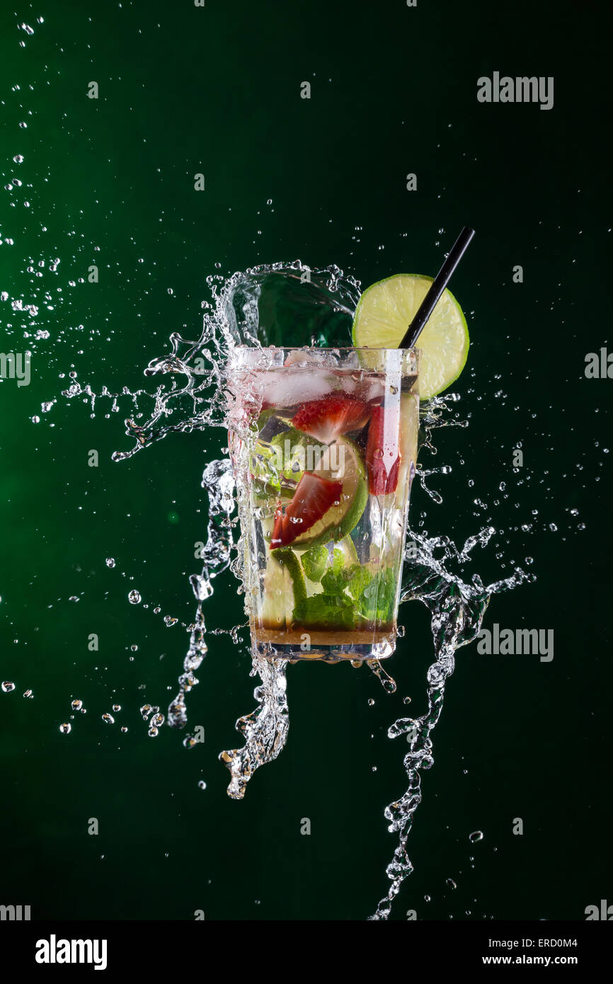 fresh mojito drink with liquid splash, freeze motion Stock Photo - Alamy