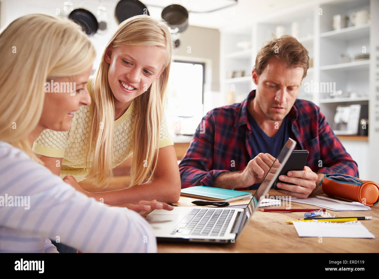 Daughter helping her parents with new technology Stock Photo - Alamy
