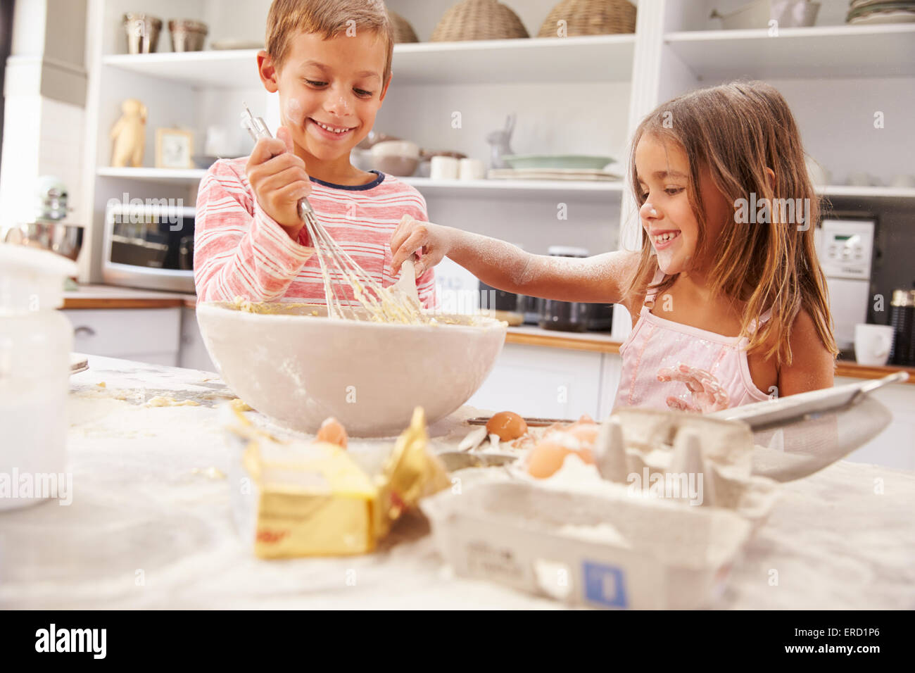 Kids making mess in kitchen hi-res stock photography and images - Alamy