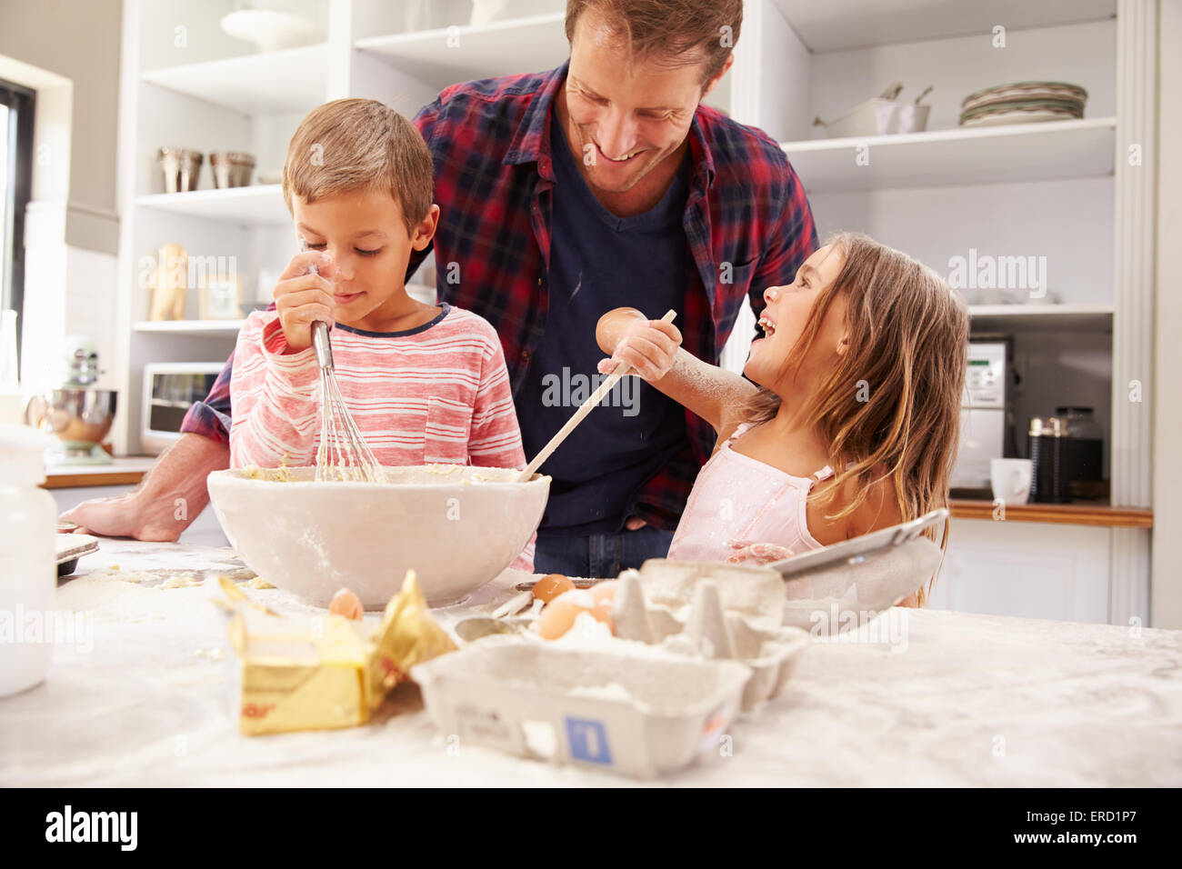 Father baking with children Stock Photo - Alamy