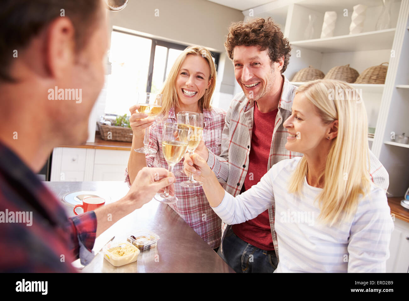 Four friends holding hi-res stock photography and images - Alamy