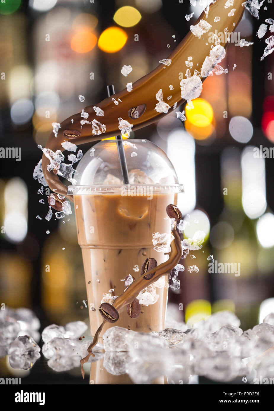 Cold coffee drink with ice, beans and splash, close-up Stock Photo - Alamy