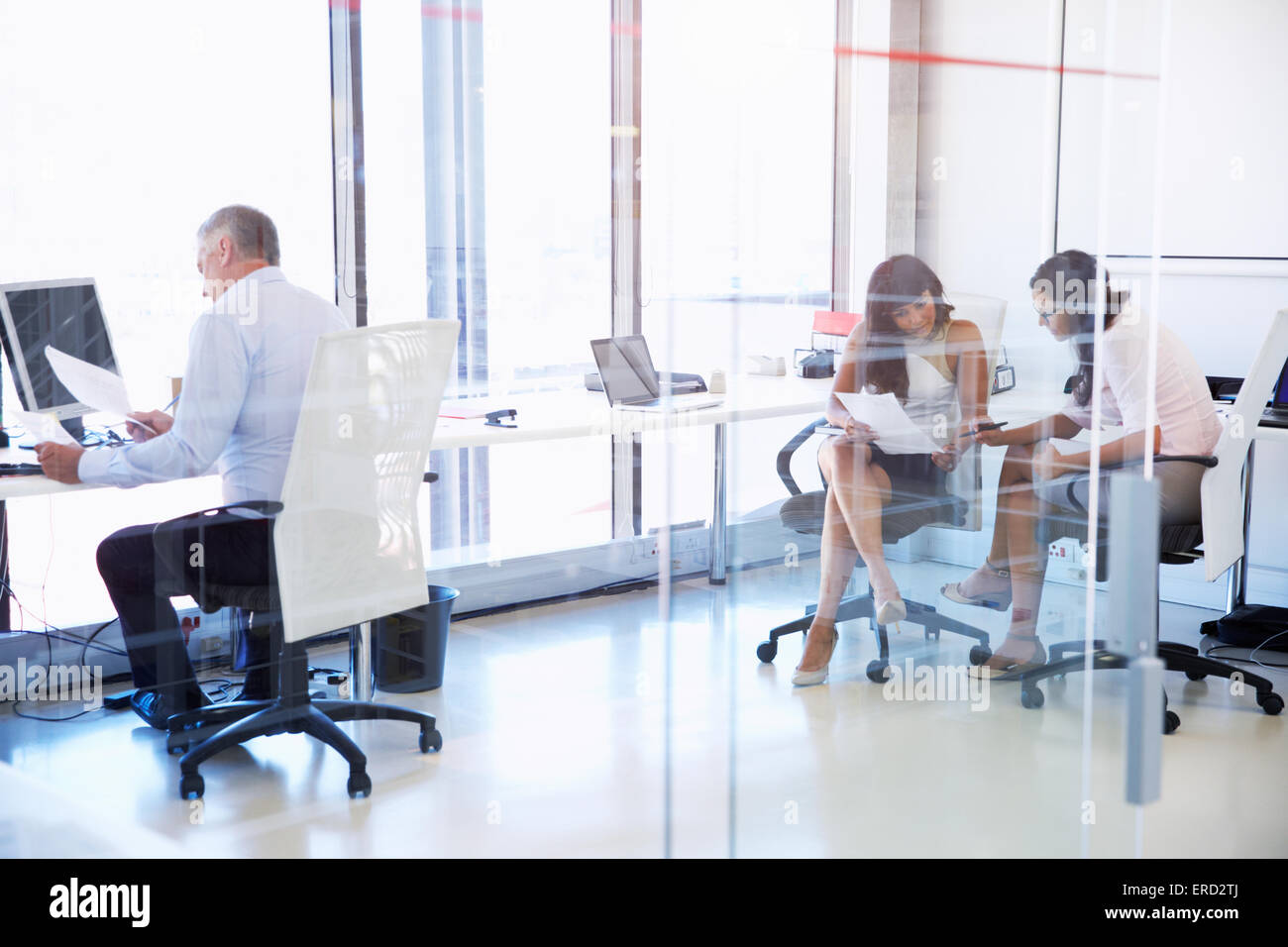 Group of people working in a modern office Stock Photo - Alamy