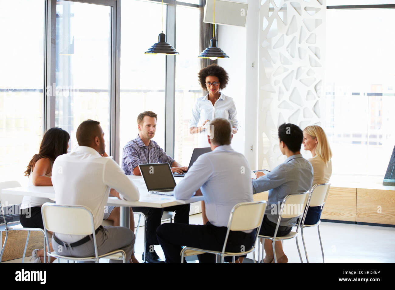Colleagues at an office meeting Stock Photo - Alamy