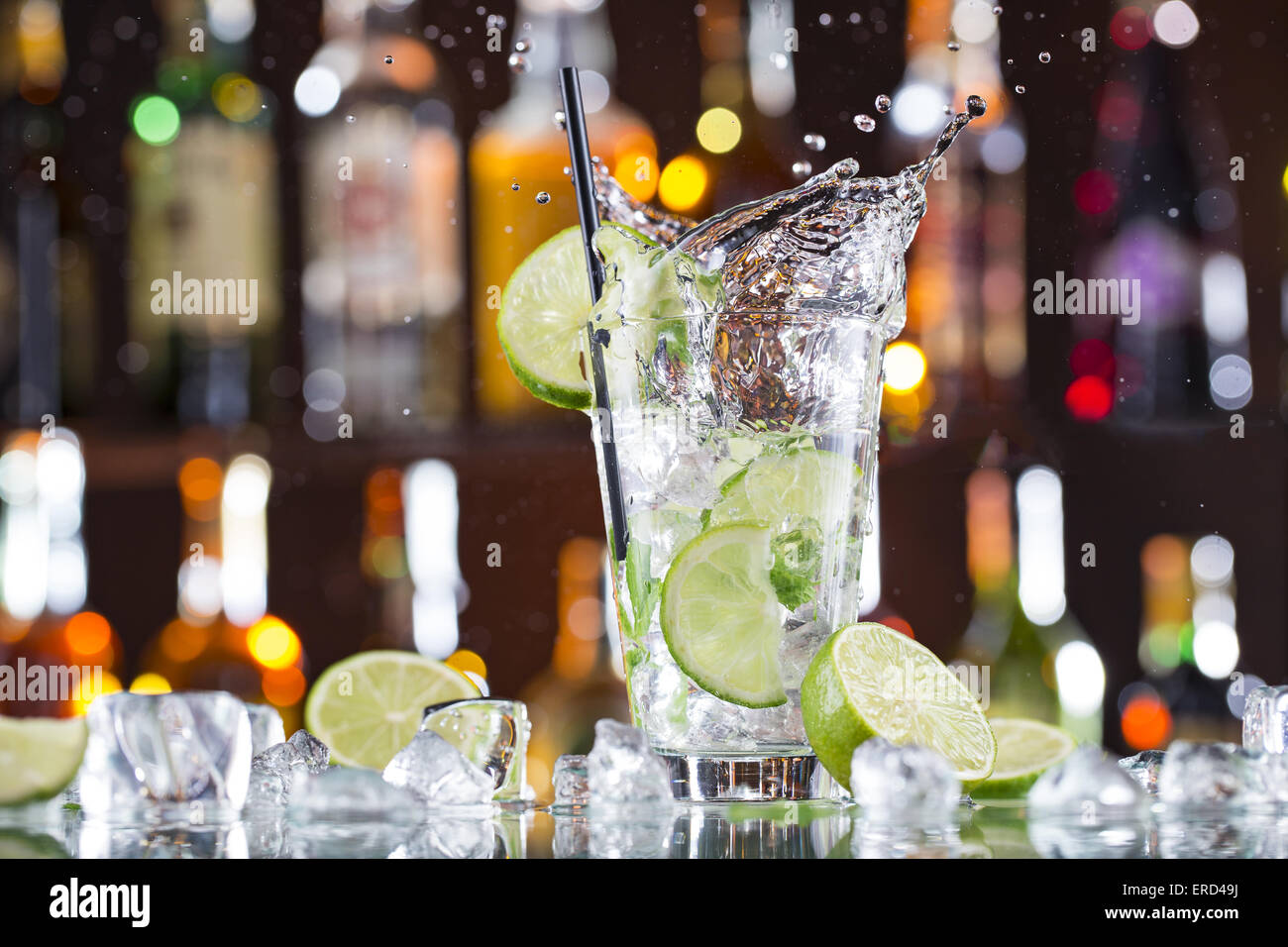 fresh mojito drink with liquid splash, freeze motion Stock Photo - Alamy