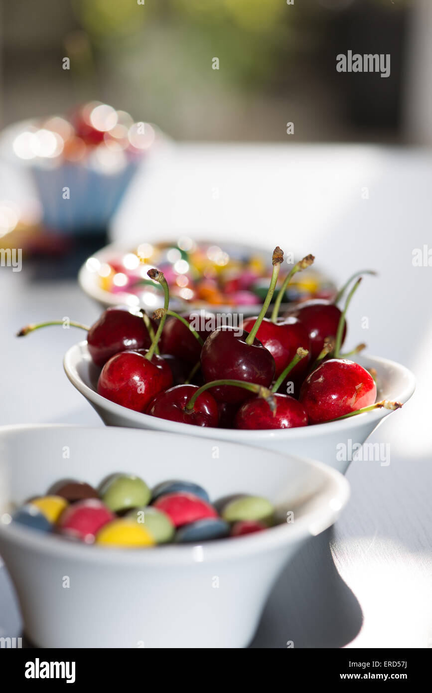 fruit vs candy, health Stock Photo - Alamy