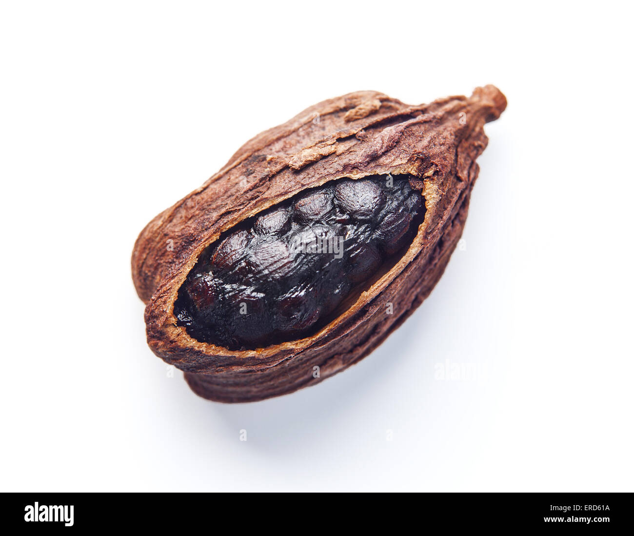 Black cardamom pods isolated on white background Stock Photo - Alamy
