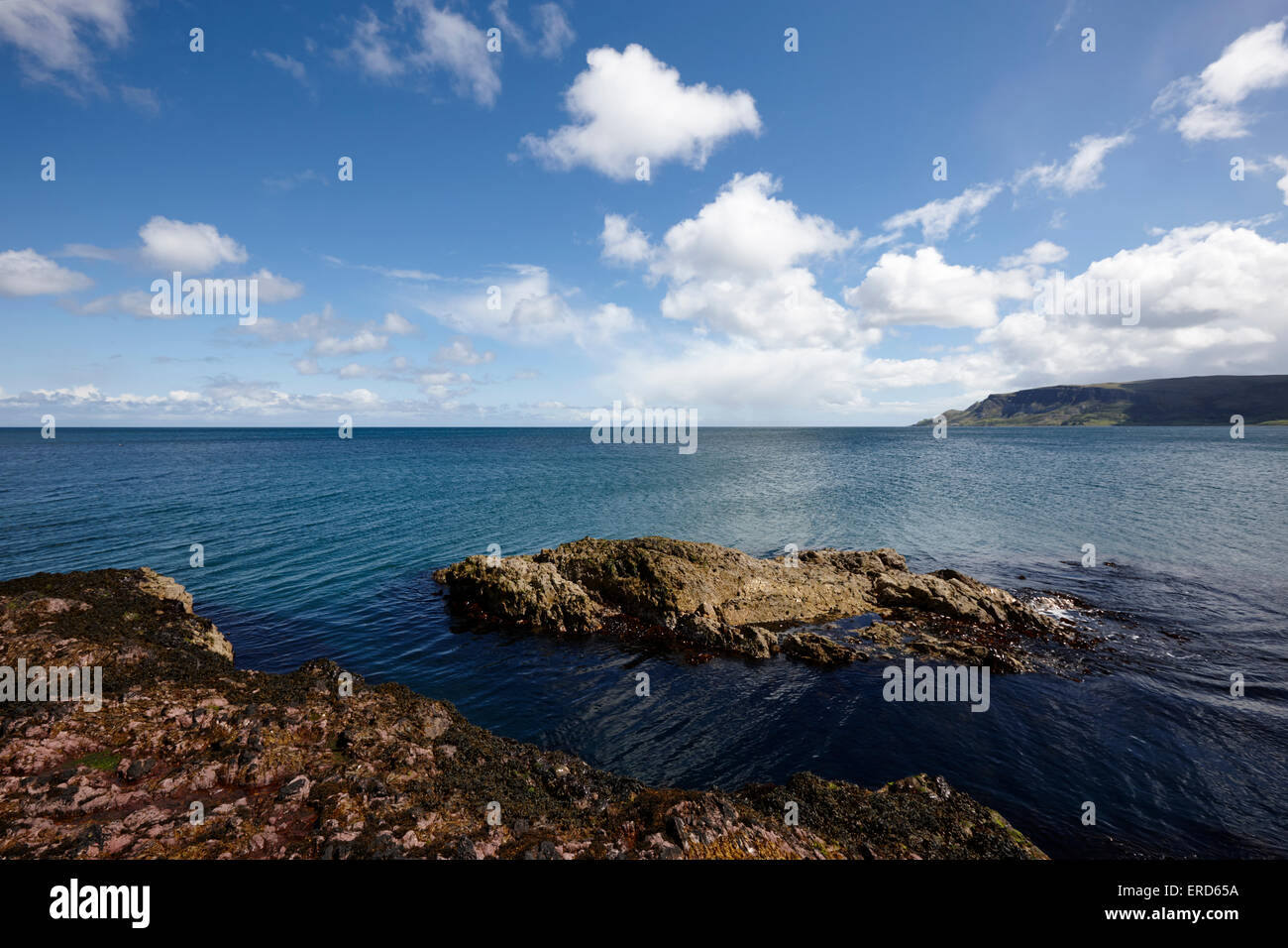 promontory pink dacite rocks at limerick point Cushendall County Antrim ...