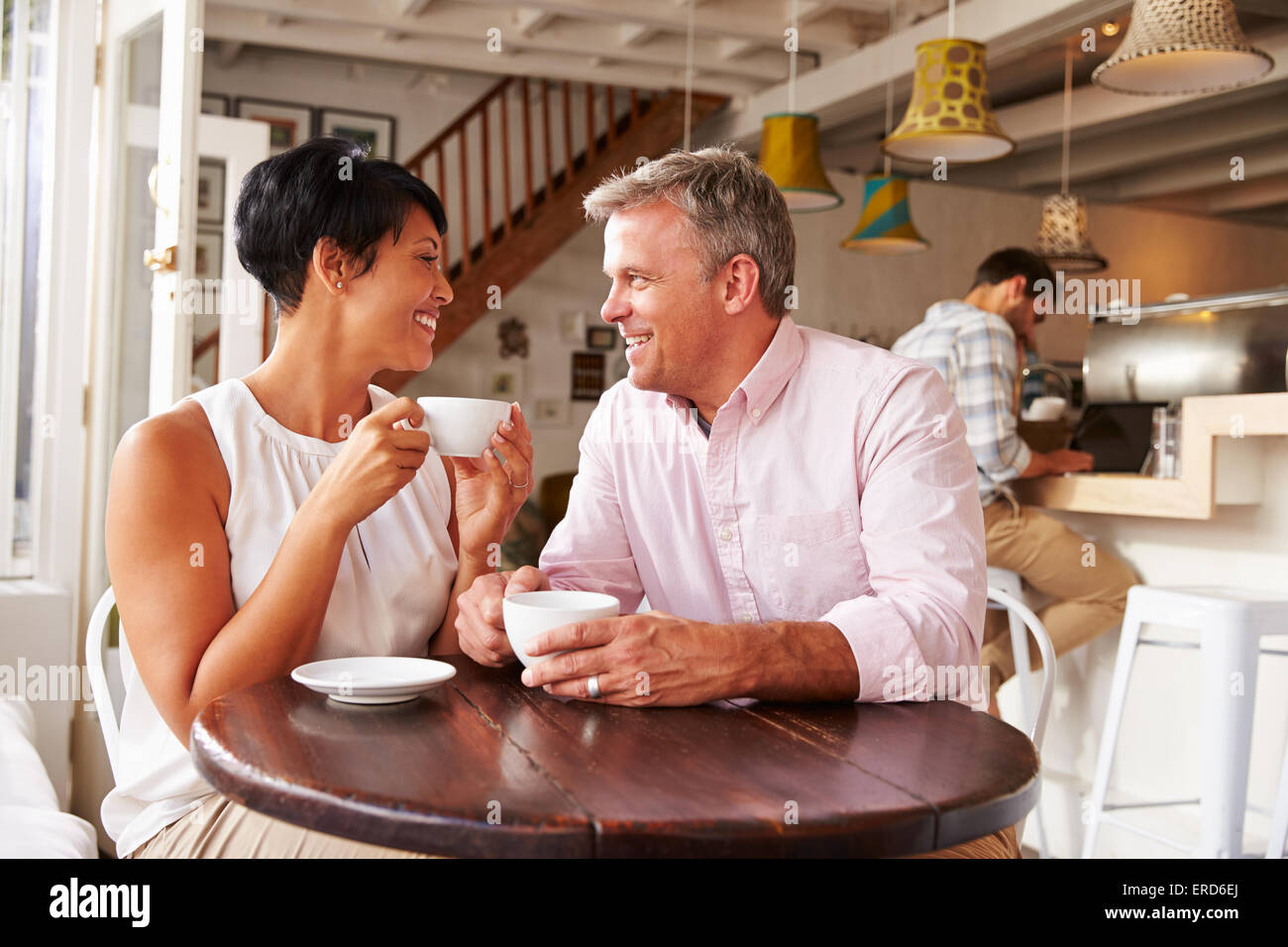 Middle aged people meeting in a cafe Stock Photo - Alamy