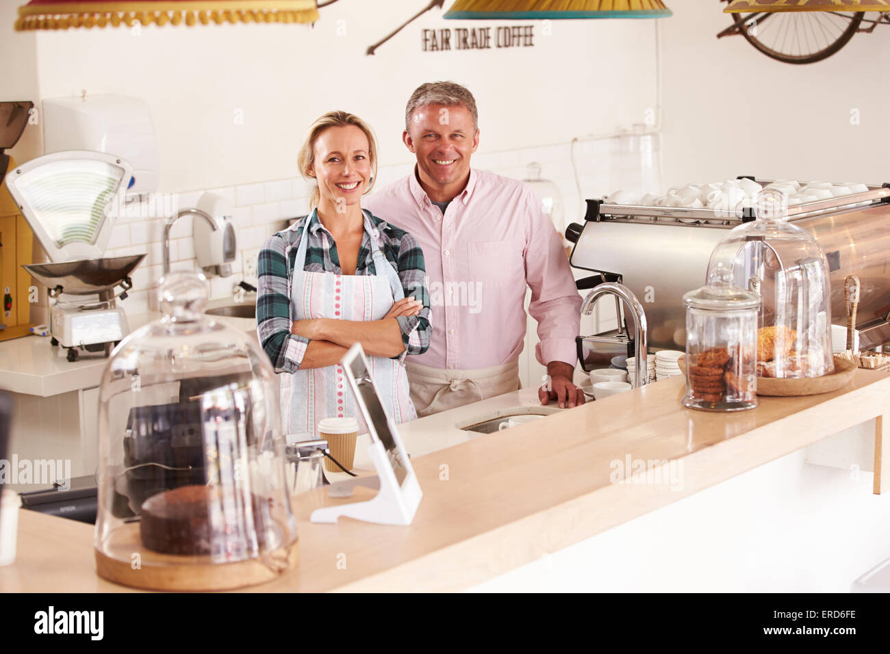 Happy cafe staff Stock Photo - Alamy