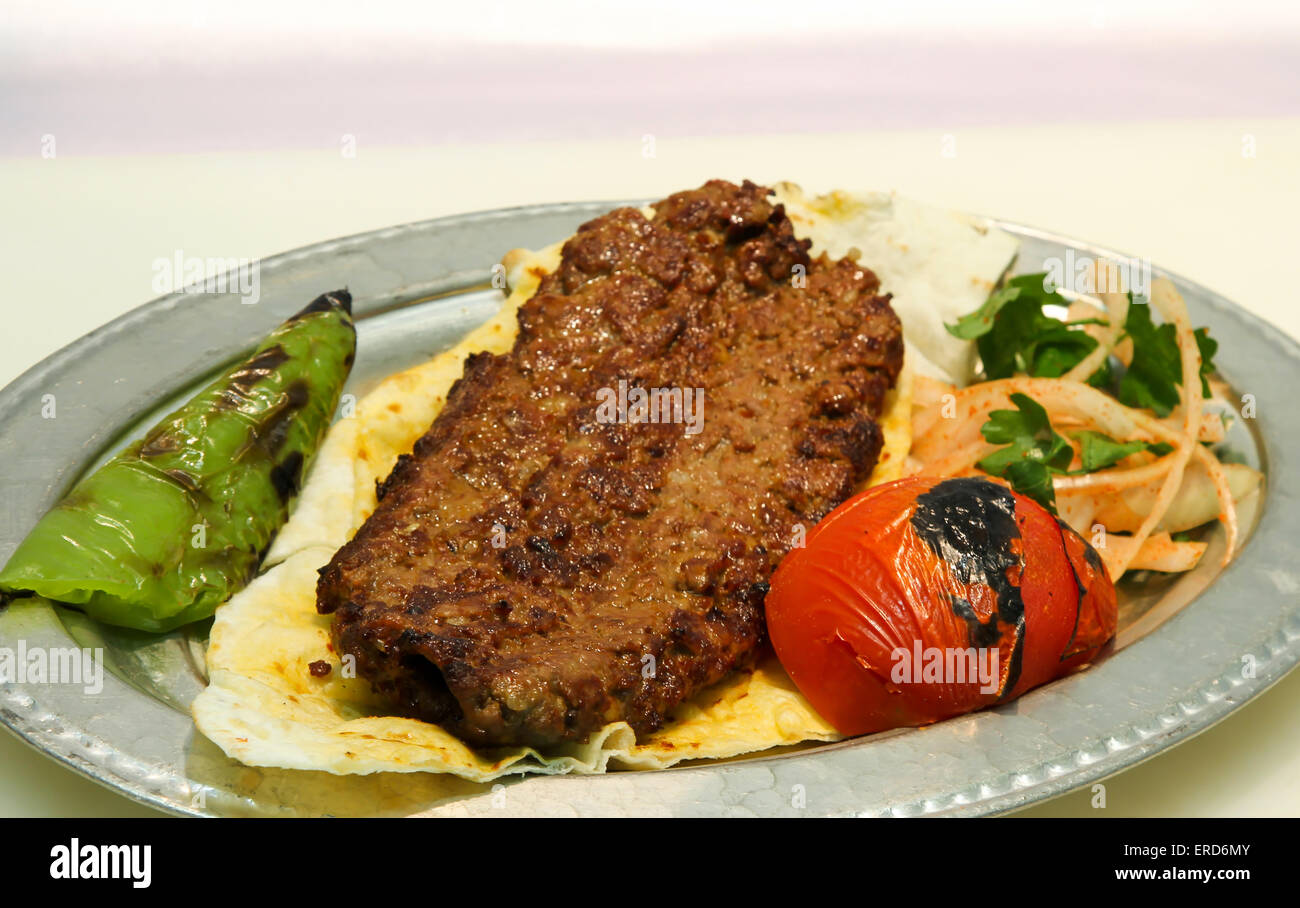 Turkish Kebab served in an anatolian plate Stock Photo - Alamy