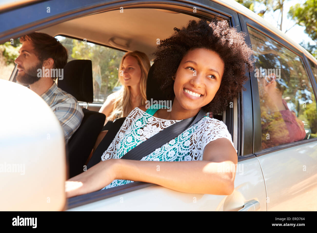 Group Of Friends In Car On Road Trip Together Stock Photo - Alamy