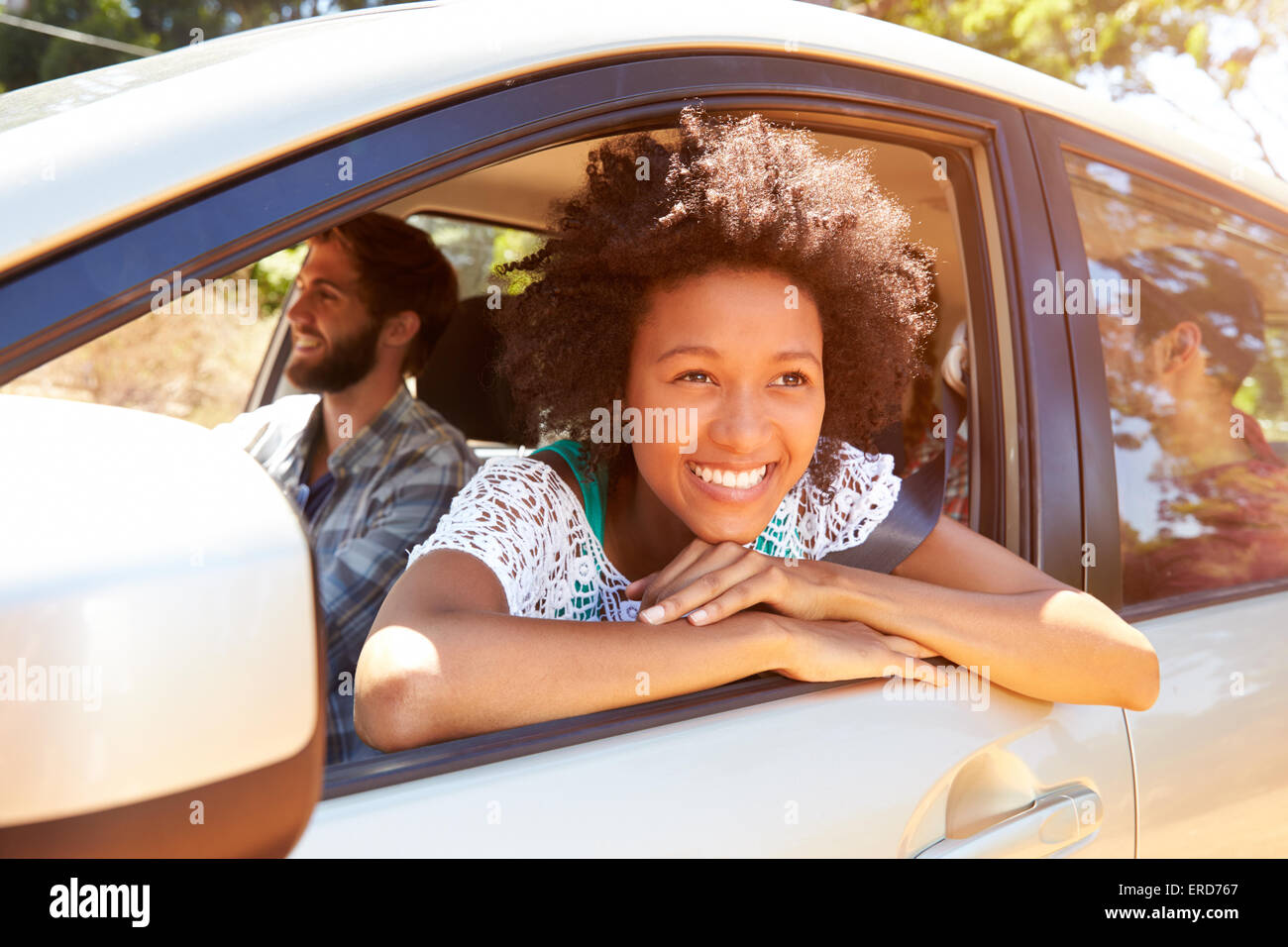 Group Of Friends In Car On Road Trip Together Stock Photo - Alamy