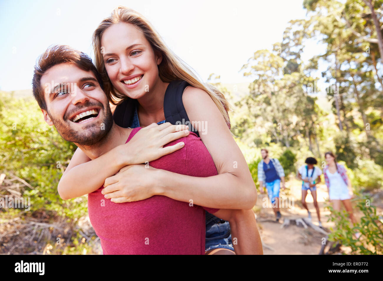 Group Of Friends On Walk Through Countryside Together Stock Photo - Alamy