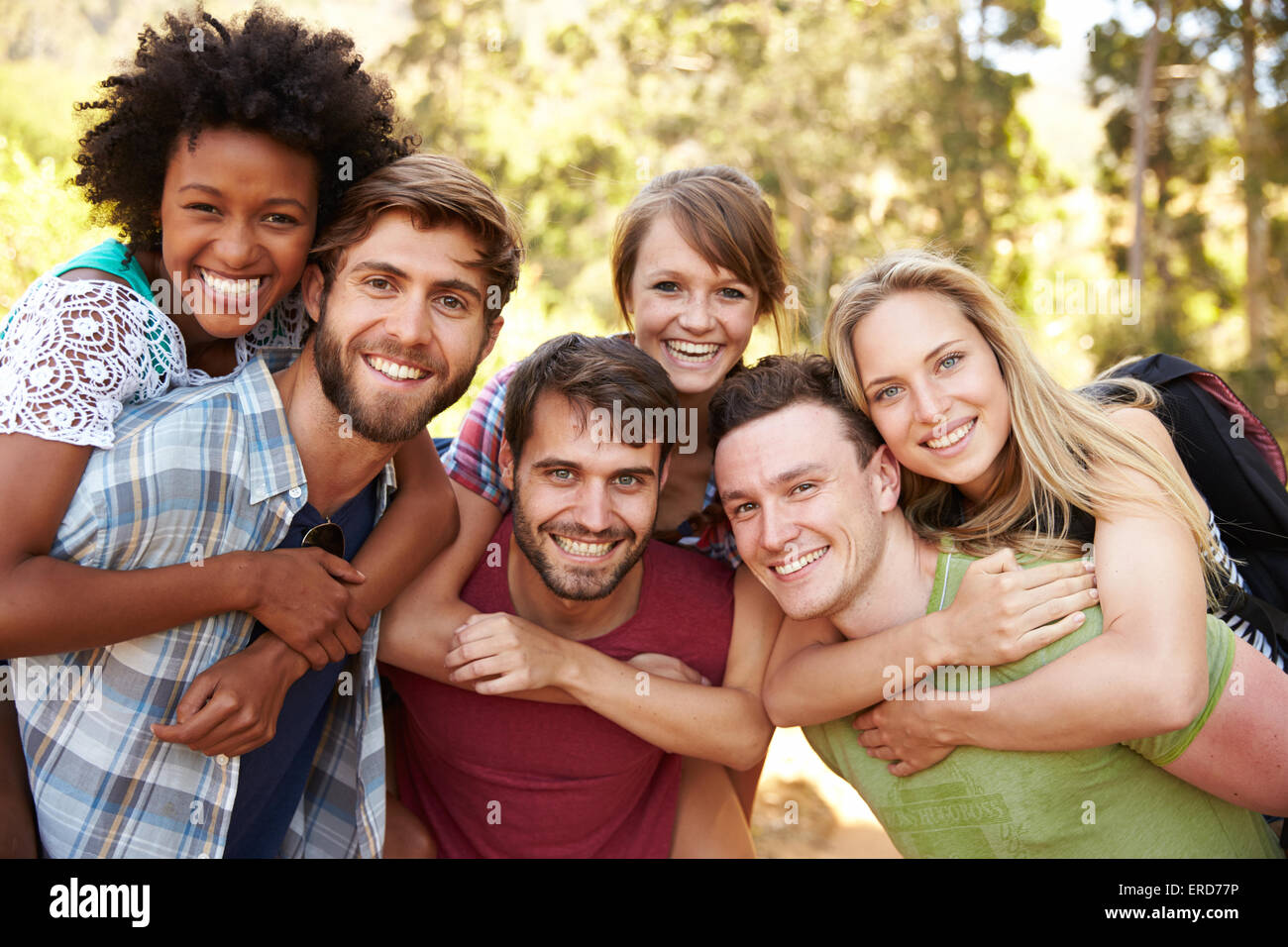 Group Of Friends On Walk Through Countryside Together Stock Photo - Alamy