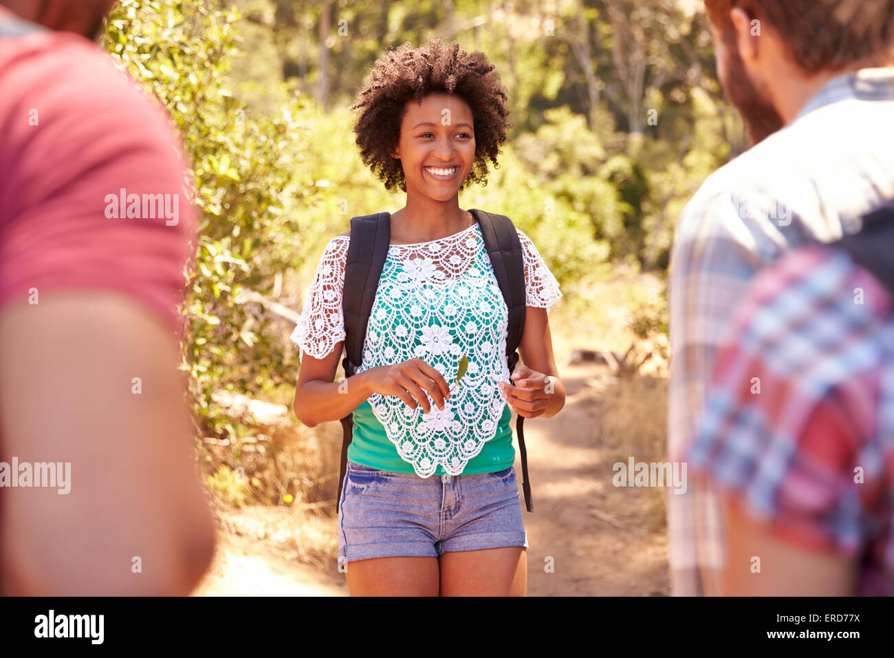 Group Of Friends On Walk Through Countryside Together Stock Photo - Alamy