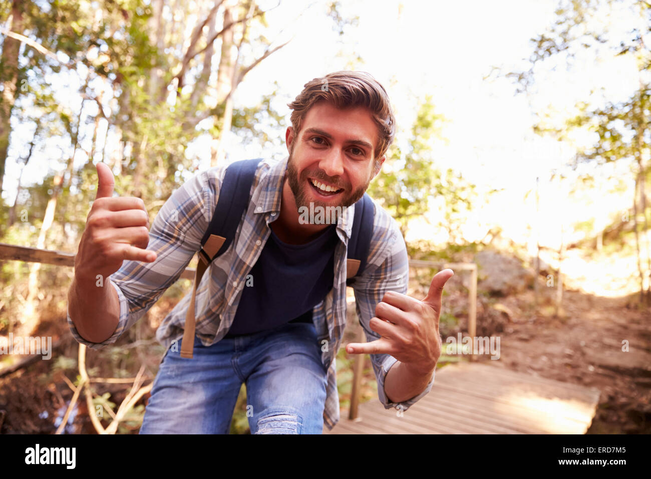 Man On Walk Making Funny Gesture At Camera Stock Photo - Alamy