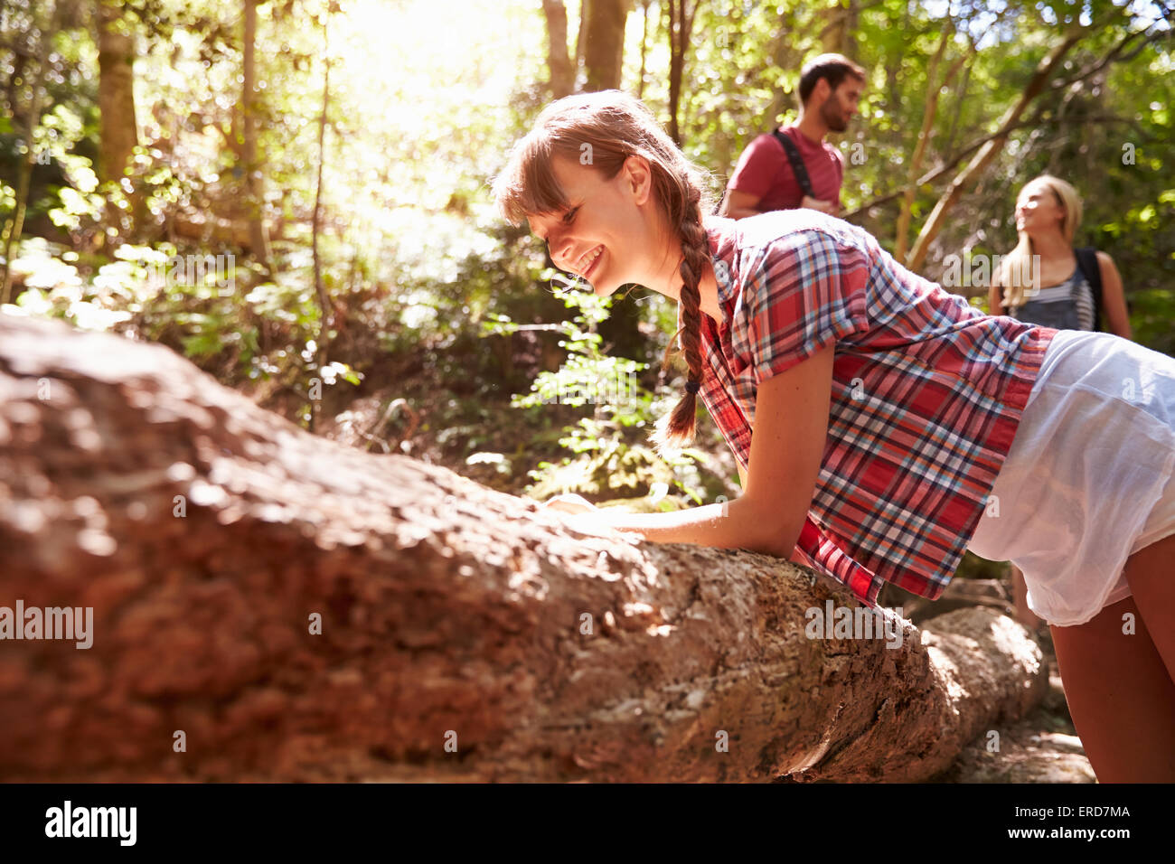 Woman Examining Nature During Walk In Countryside Stock Photo - Alamy