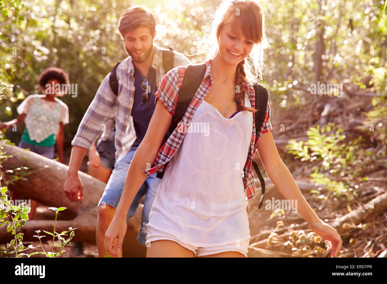 Group Of Friends On Walk Through Countryside Together Stock Photo - Alamy