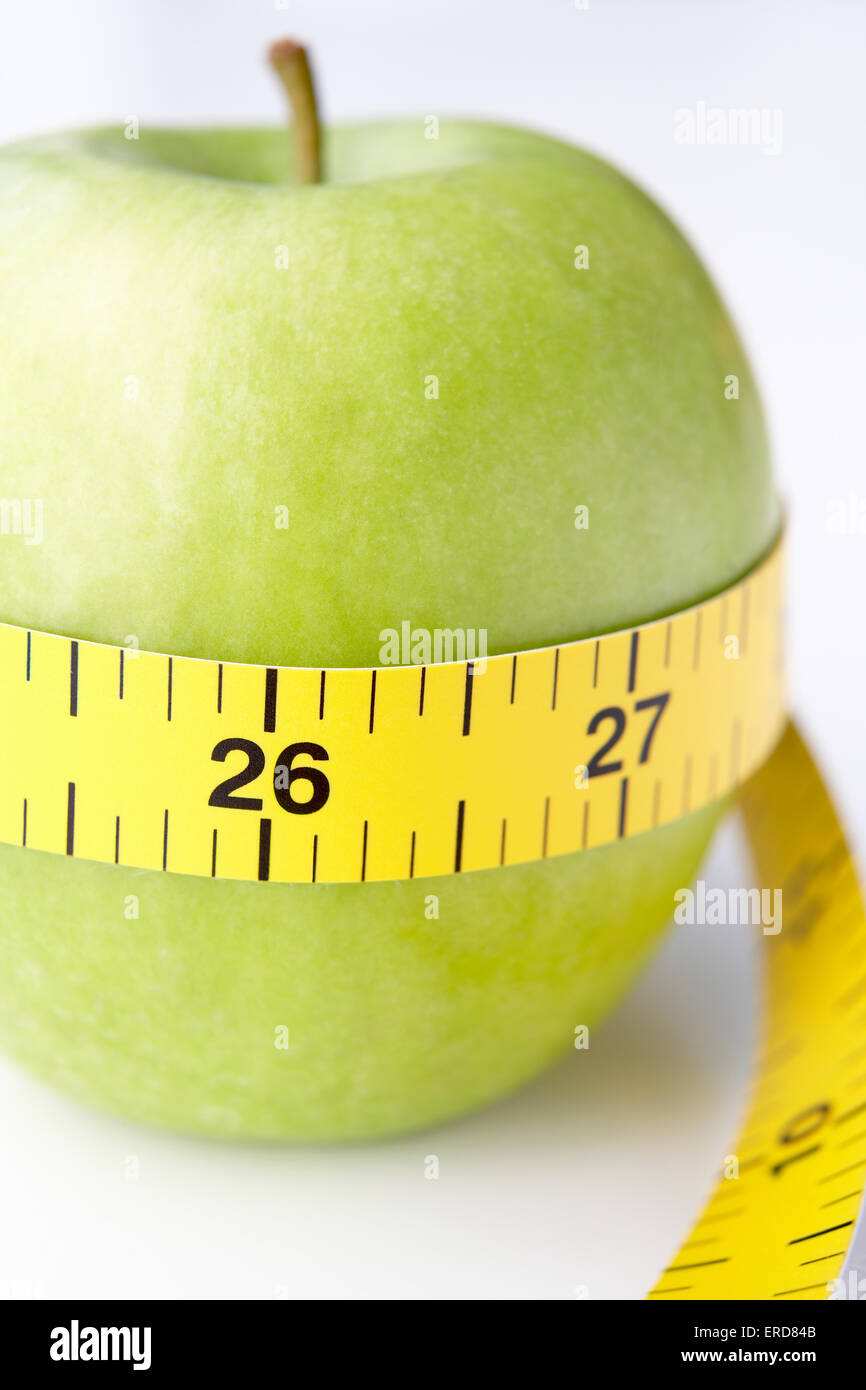 Apple With Tape Measure Stock Photo - Alamy