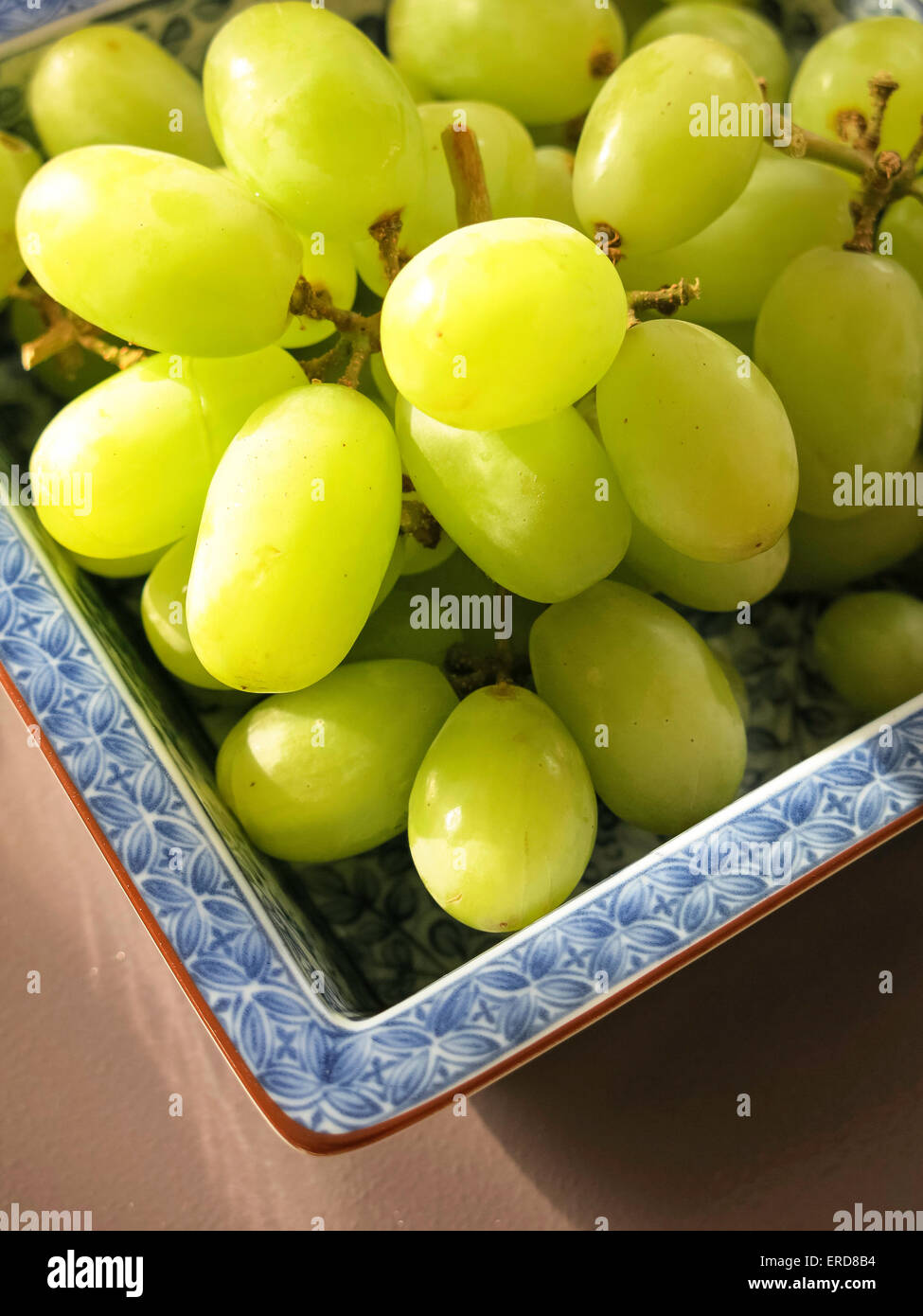 Close up of Green Grapes in a China Dish Stock Photo - Alamy