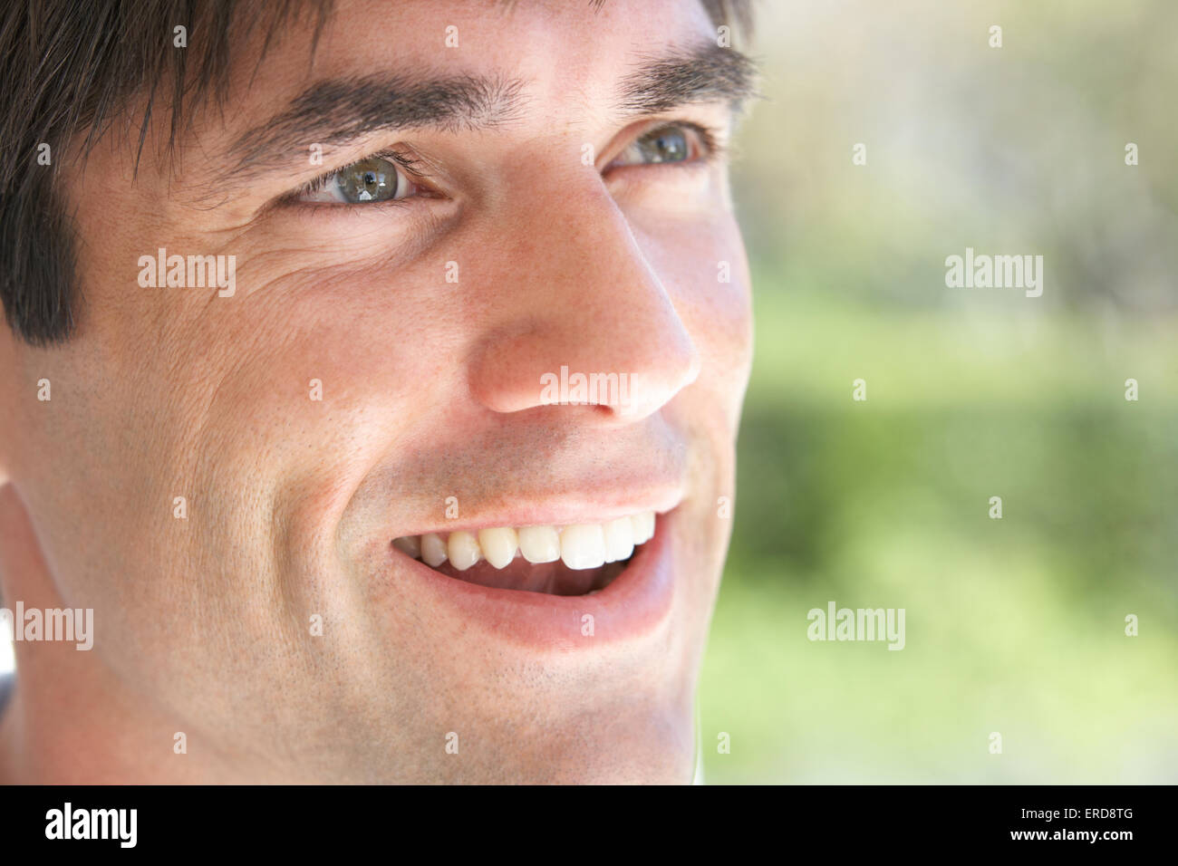 Portrait Of Man Smiling Stock Photo - Alamy