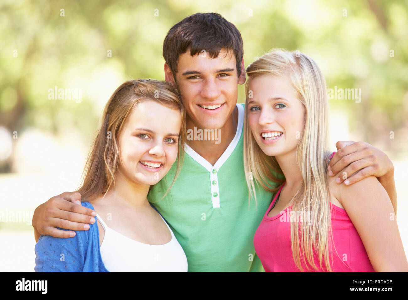 Group Of Teenage Friends Having Fun In Park Stock Photo - Alamy
