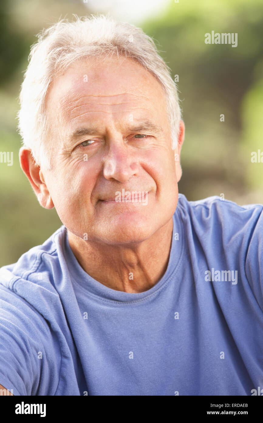 Portrait Of Senior Man Relaxing In Countryside Stock Photo - Alamy