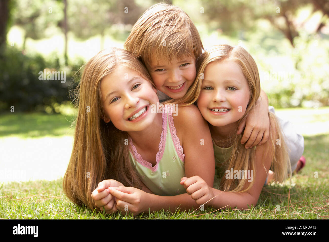 Group Of Children Having Fun In Park Stock Photo - Alamy