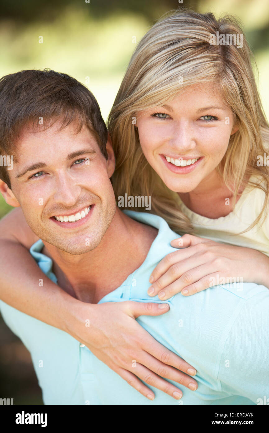 Young Couple Having Fun In Countryside Together Stock Photo - Alamy