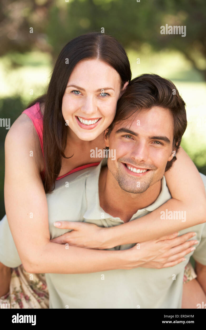 Young Couple Having Fun In Countryside Together Stock Photo - Alamy