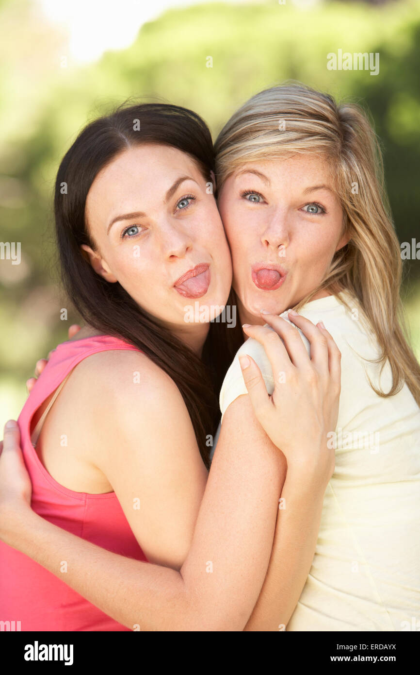 Two Female Friends Pulling Faces Together Stock Photo - Alamy