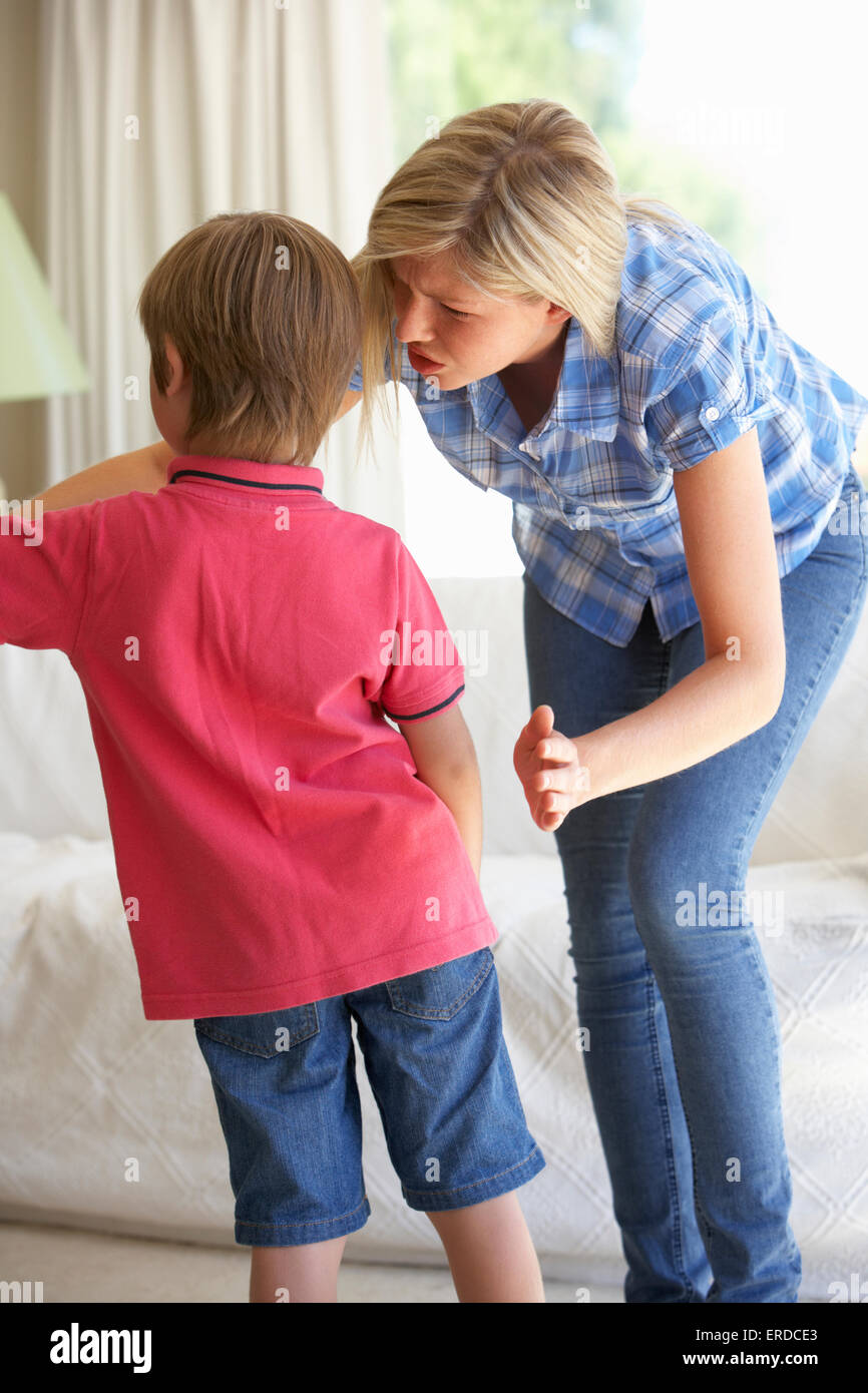 Mother Telling Off Son At Home Stock Photo - Alamy