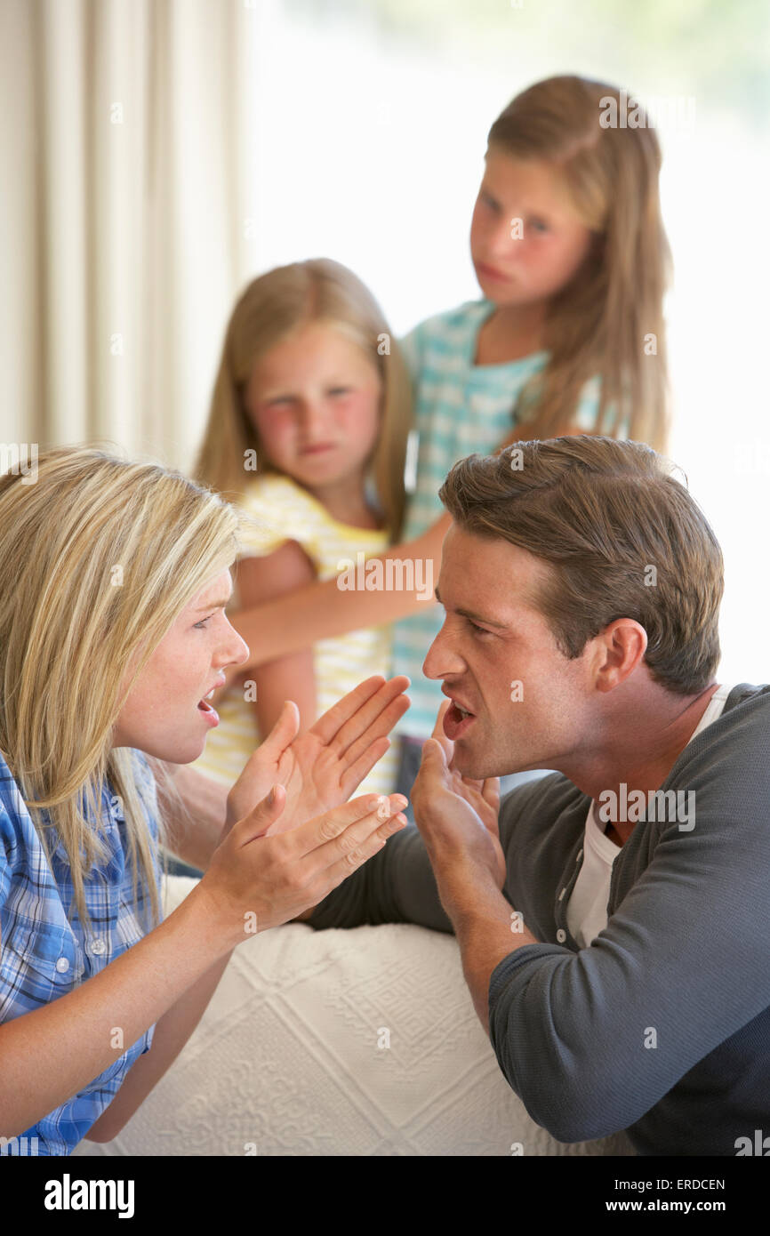 Parents Having Argument At Home In Front Of Children Stock Photo - Alamy