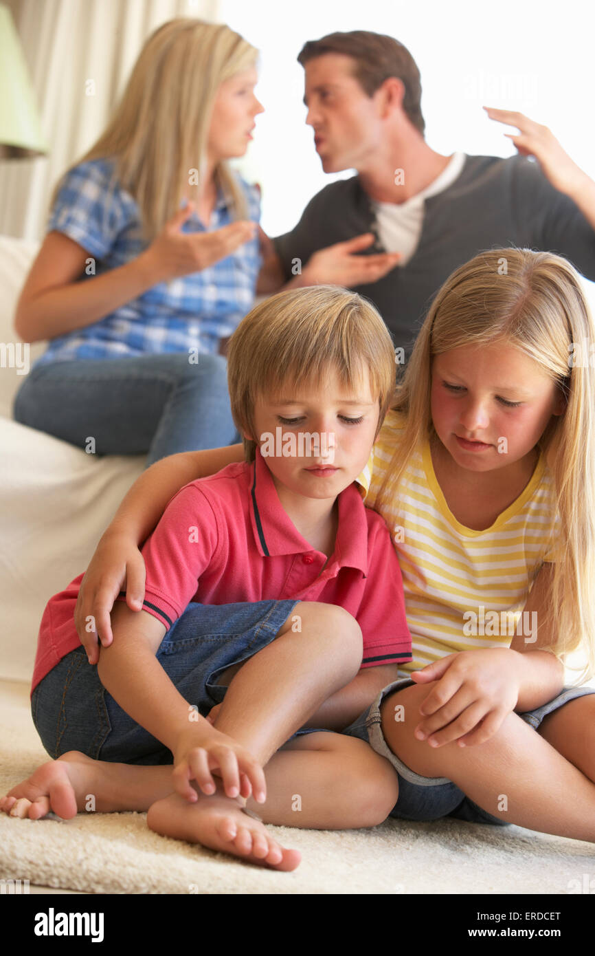 Parents Having Argument At Home In Front Of Children Stock Photo - Alamy