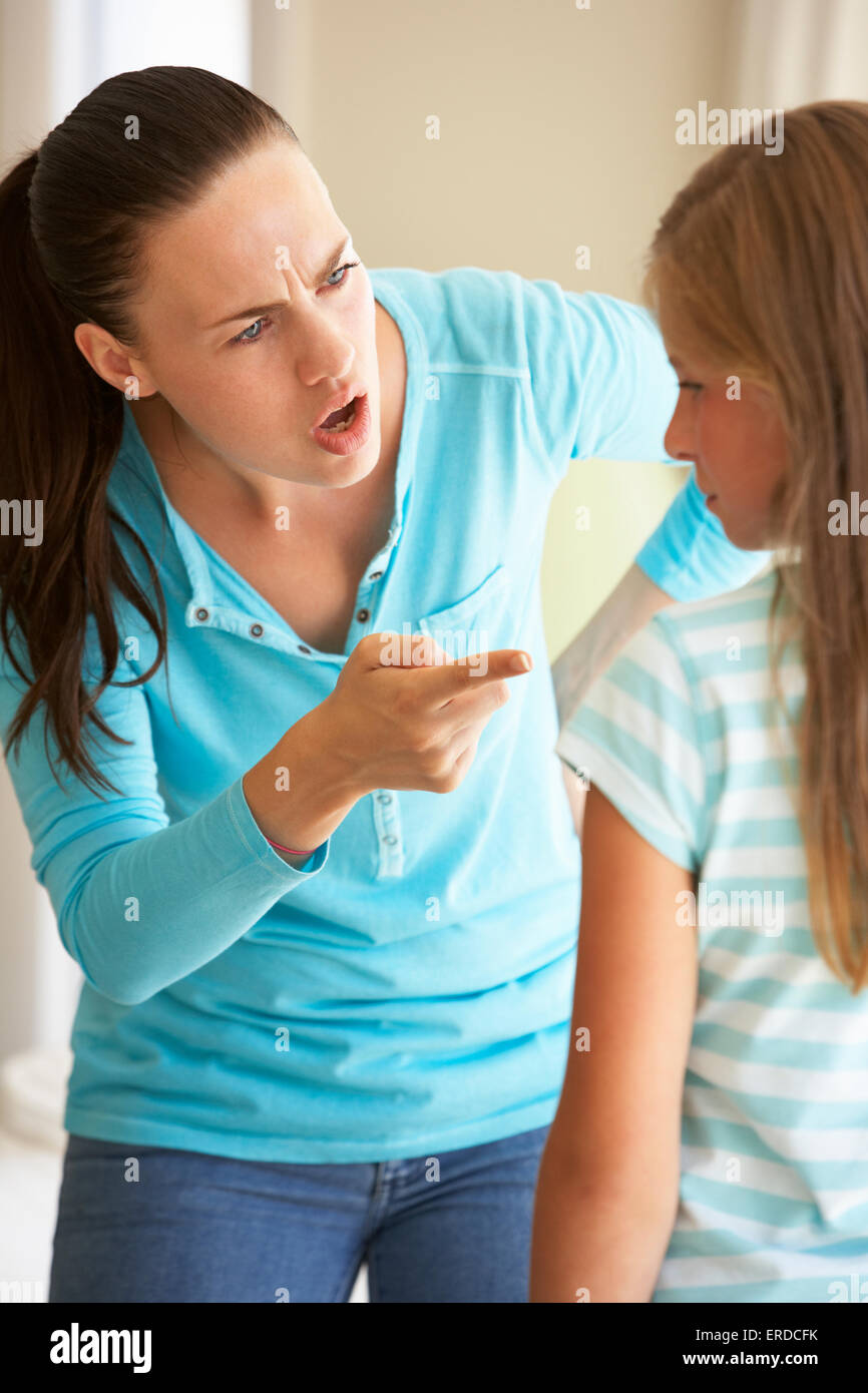 Mother Telling Off Daughter At Home Stock Photo - Alamy