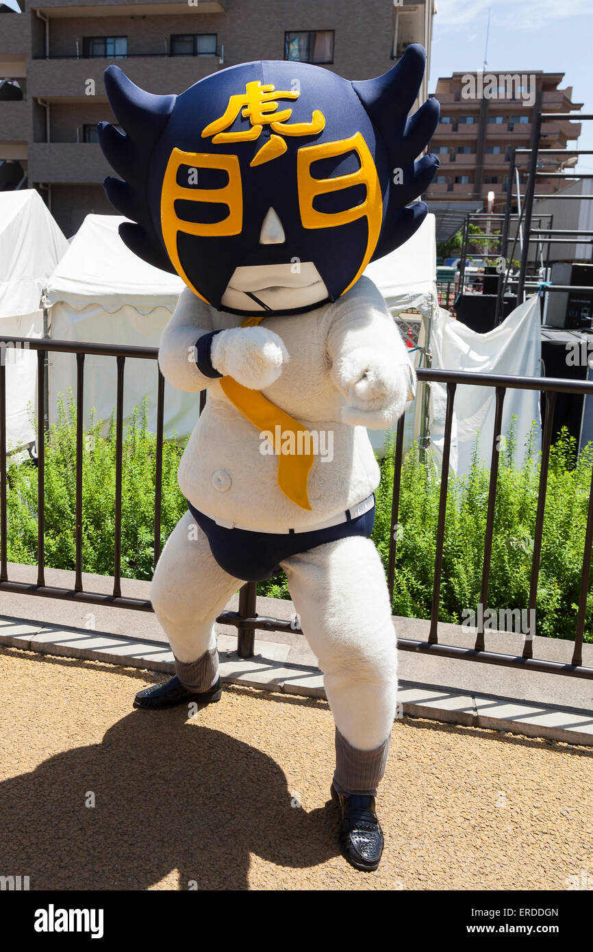 A mascot called Come on Toranomon performs during the ''Local ...