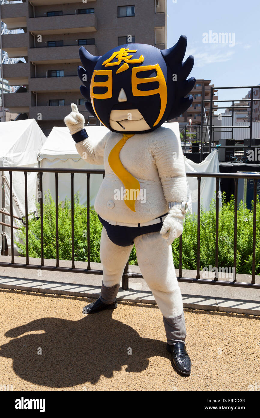 A mascot called Come on Toranomon performs during the ''Local ...