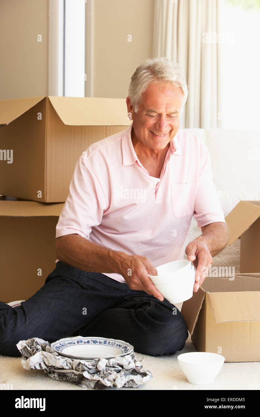 Senior Man Moving Home And Packing Boxes Stock Photo - Alamy