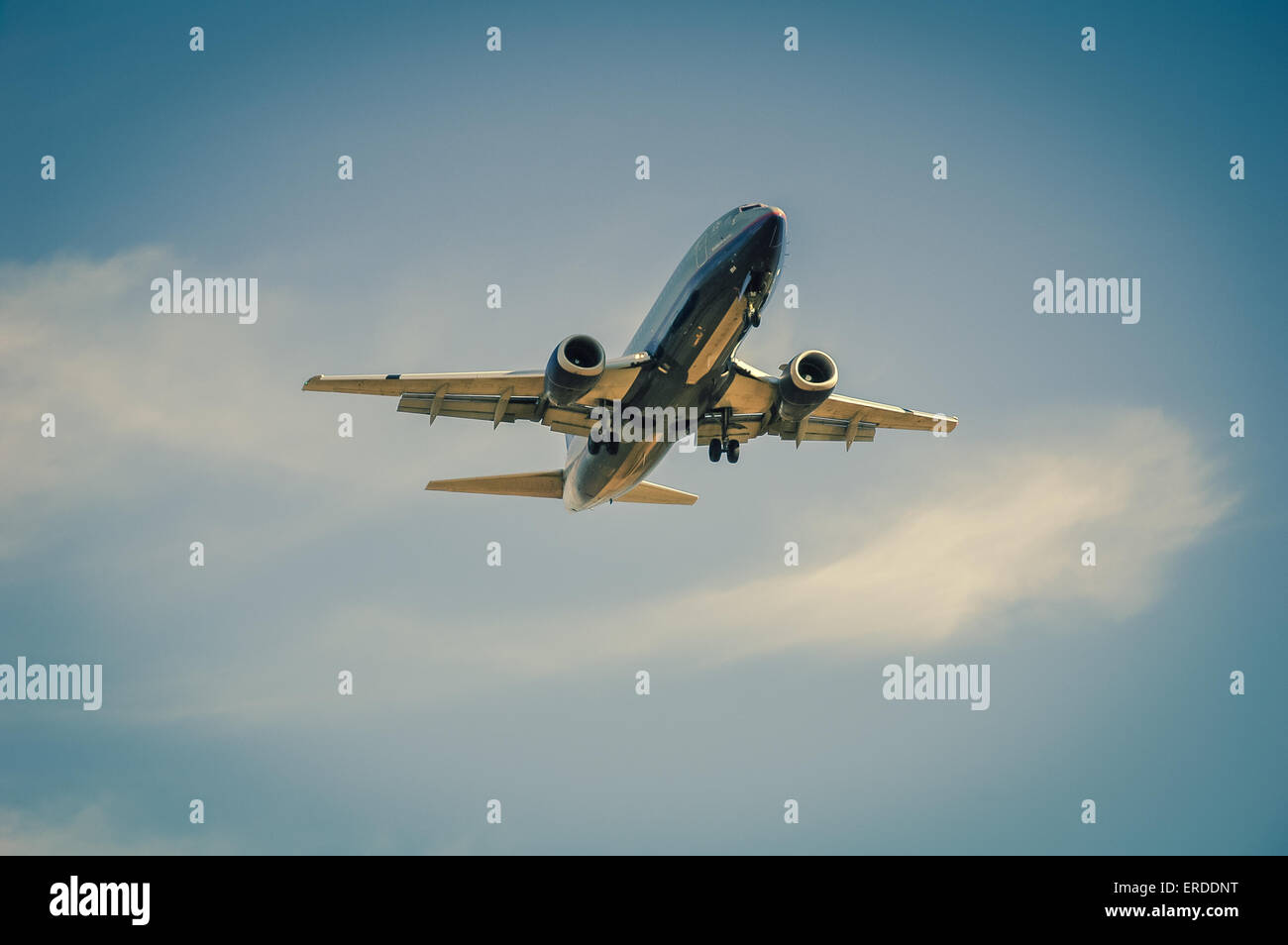 Underside of a commercial airliner plane at take off Stock Photo - Alamy