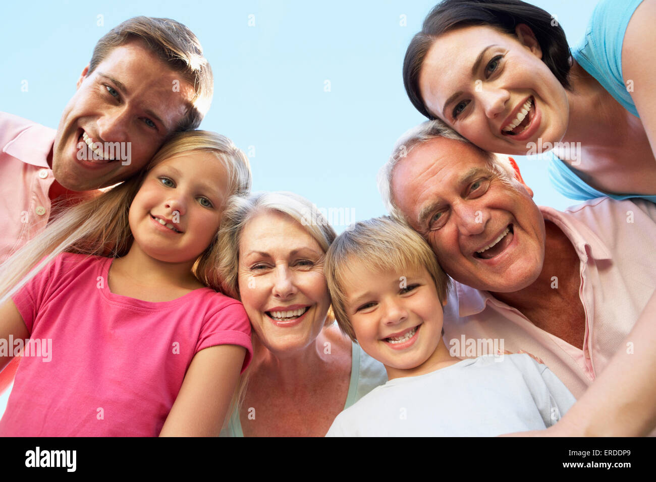 Extended Family Group Looking Down Into Camera Stock Photo - Alamy