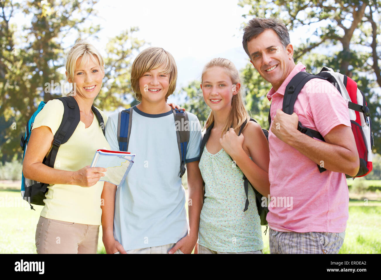 Middle Aged Family Hiking Through Countryside Stock Photo - Alamy