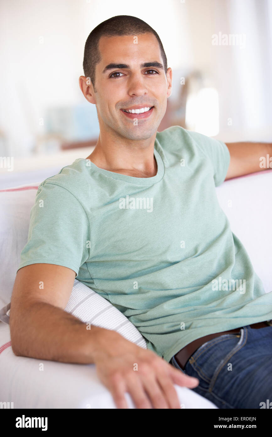 Young Man Relaxing At Home Stock Photo - Alamy