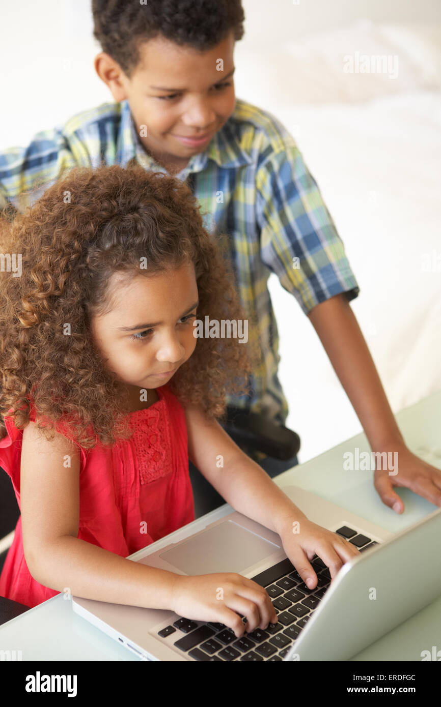 Children Using Laptop At Home Stock Photo - Alamy